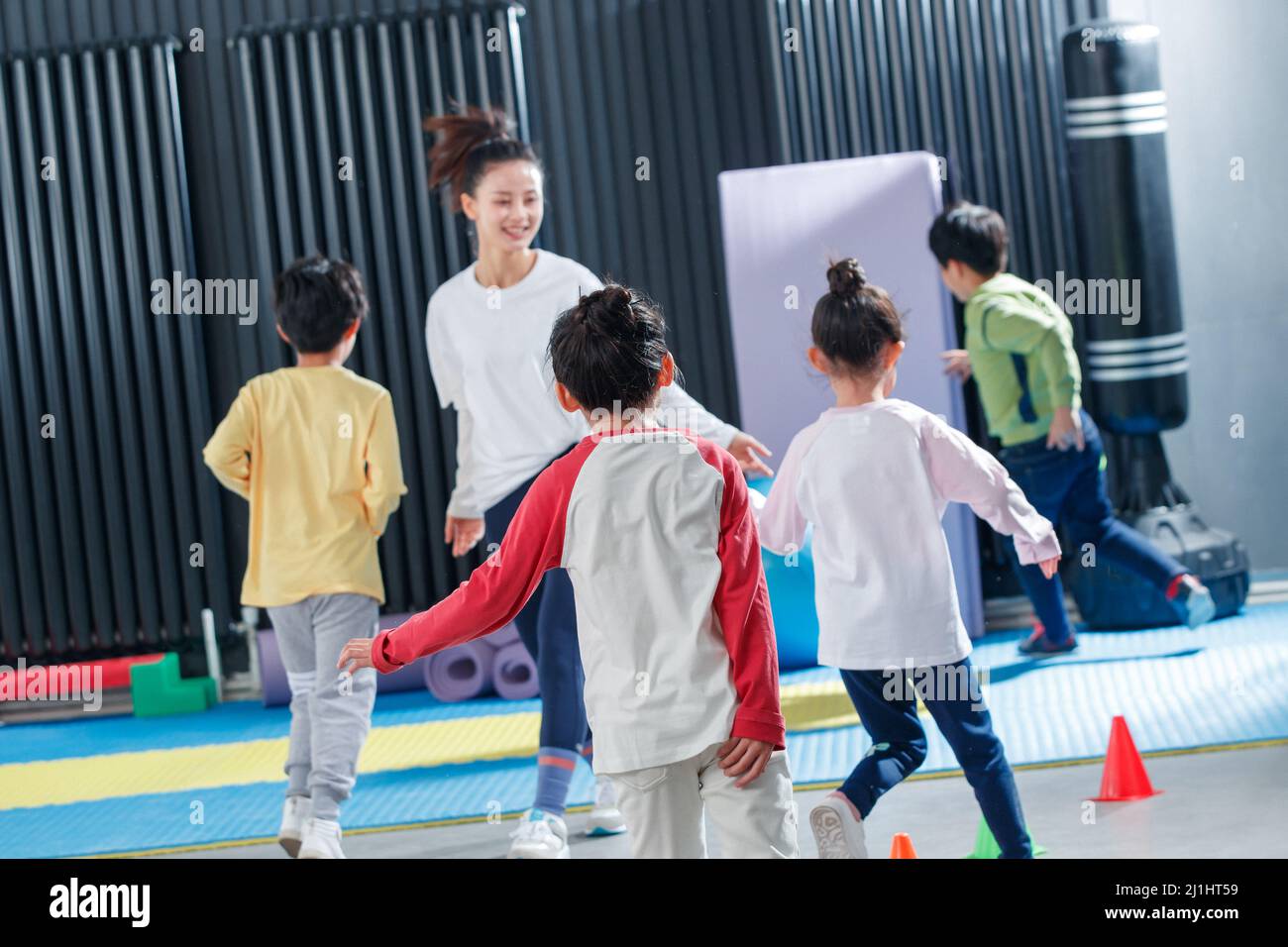Physical fitness training on teachers and students Stock Photo - Alamy