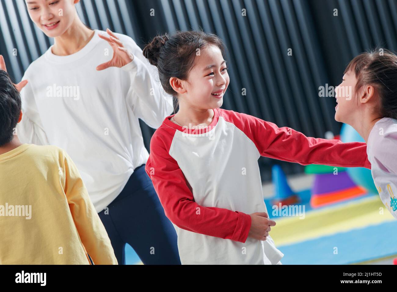 Physical fitness training on teachers and students Stock Photo - Alamy