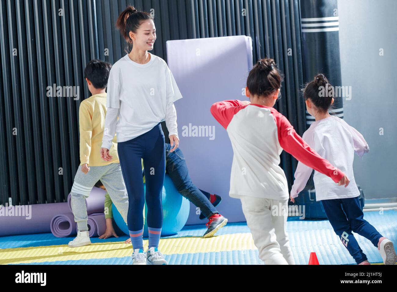 Physical fitness training on teachers and students Stock Photo - Alamy