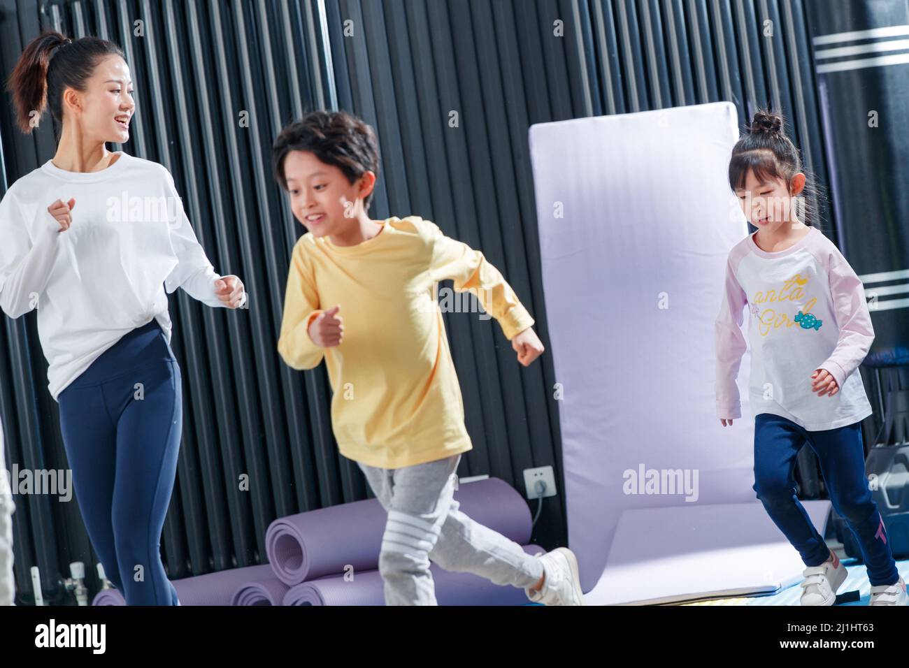 Physical fitness training on teachers and students Stock Photo - Alamy