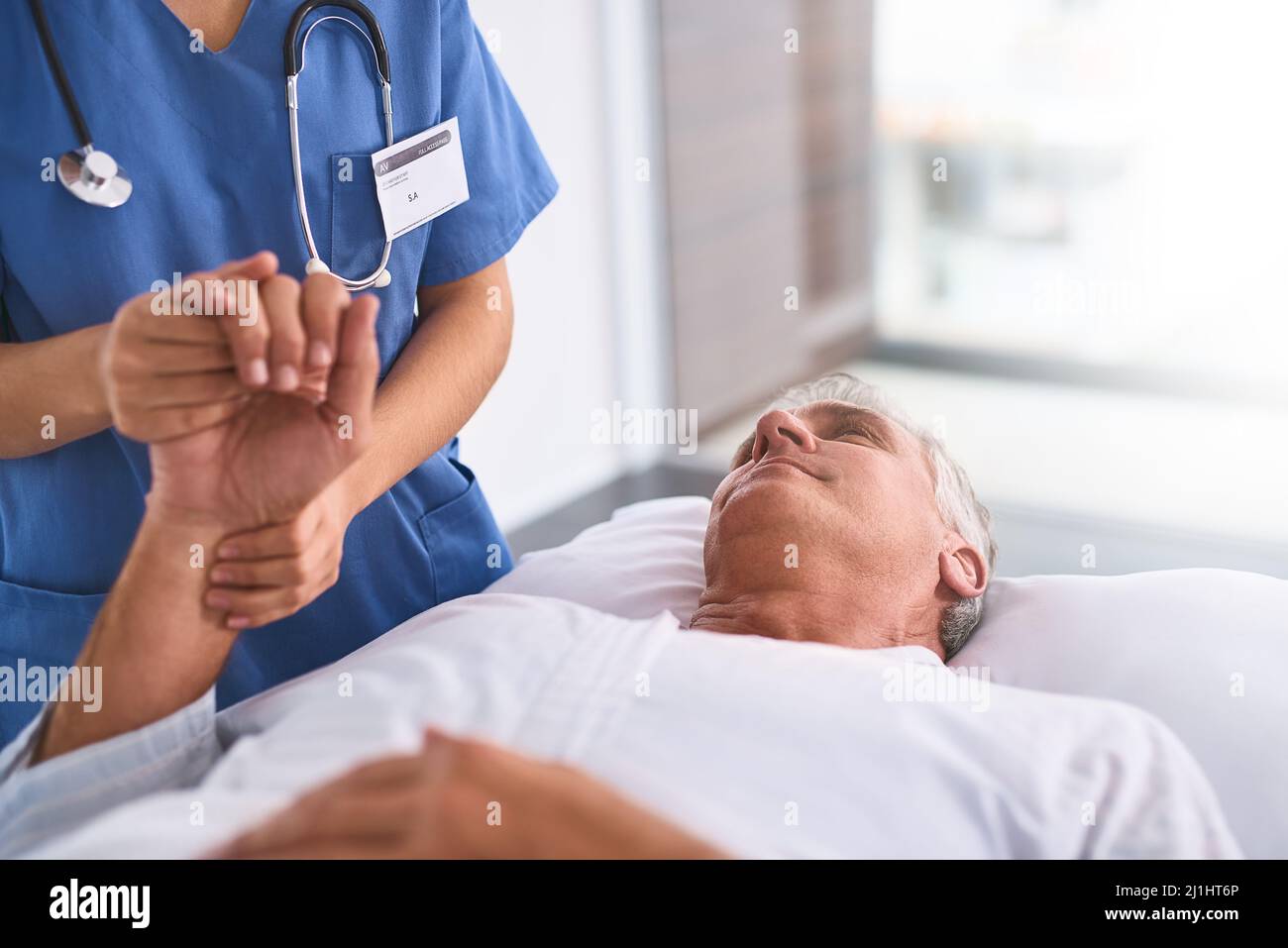 We are with you all the way. Shot of a relaxed mature male patient ...