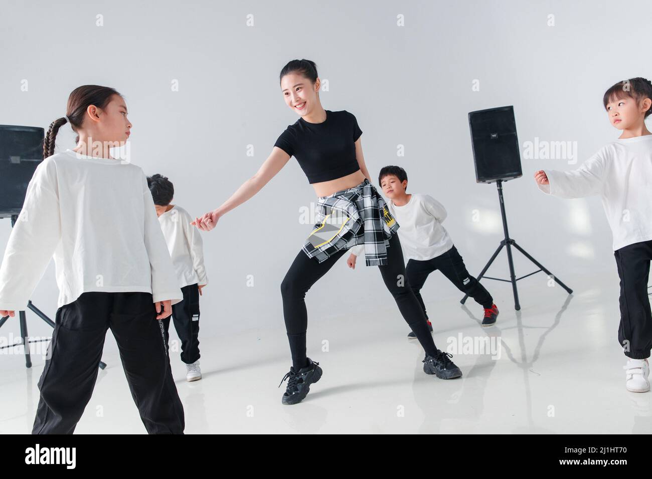 Youth dance teacher to teach the children learn how to dance Stock ...