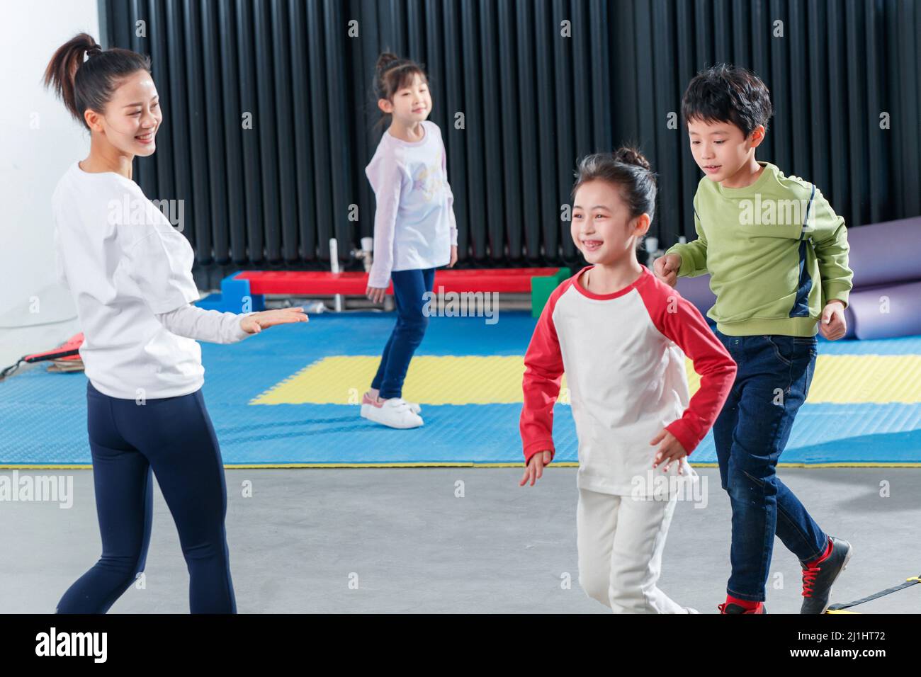 Physical fitness training on teachers and students Stock Photo - Alamy
