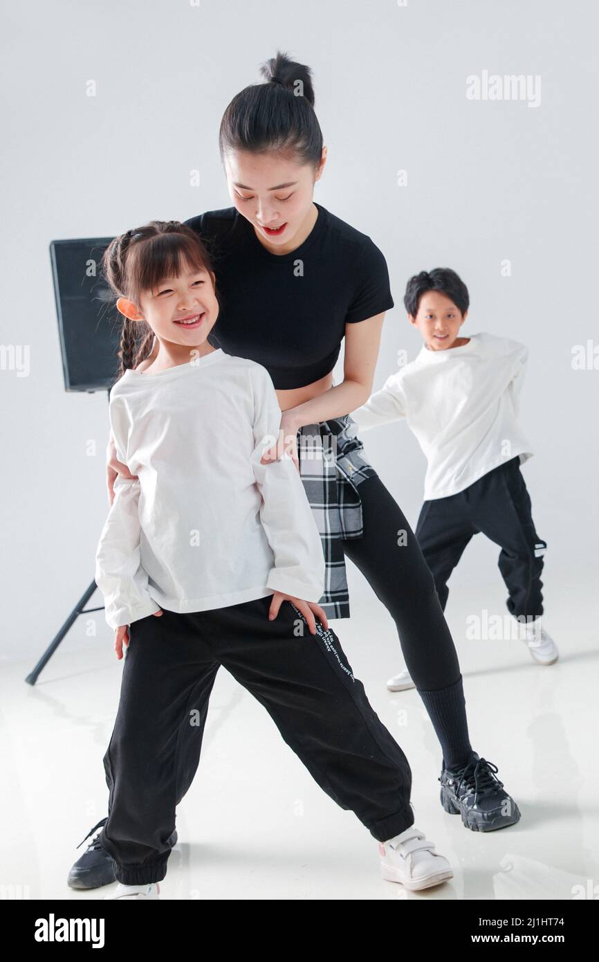 Youth dance teacher to teach the children learn how to dance Stock ...