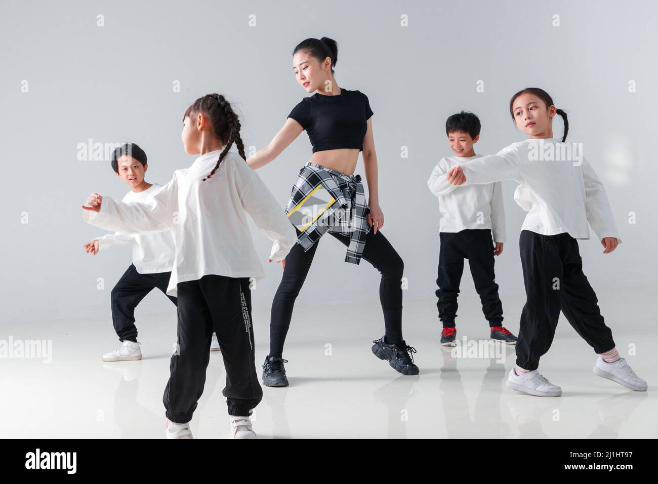 Youth dance teacher to teach the children learn how to dance Stock ...