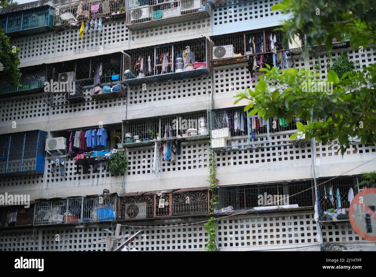 Front side of an apartment building in a poor block of Bangkok Stock ...