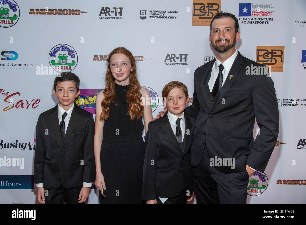 California, USA. 25th Mar, 2022. Matt Tardio with his children attends ...