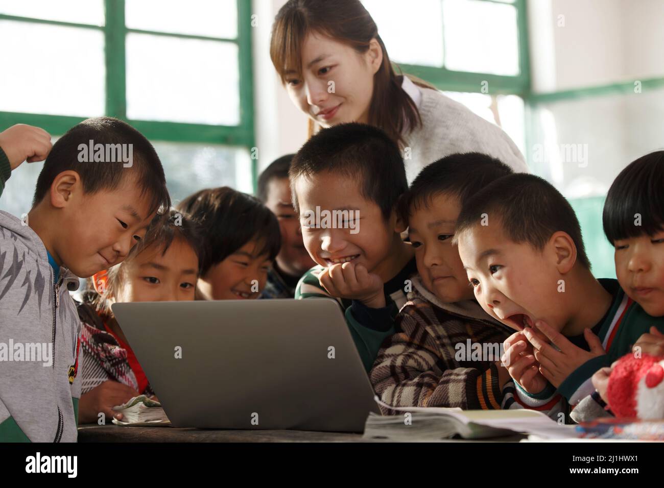 Rural female teachers and pupils in the use of computers Stock Photo ...
