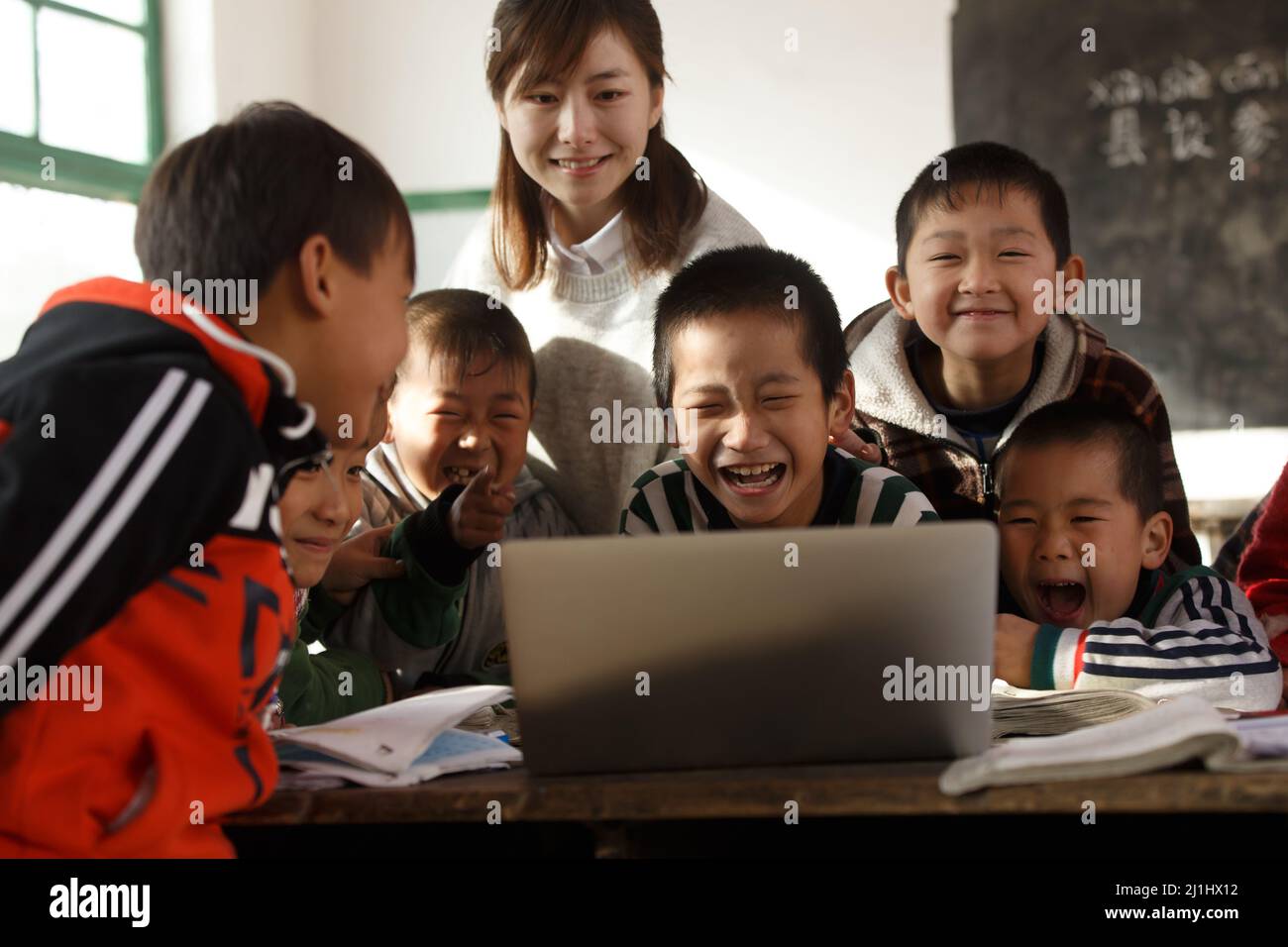 Rural female teachers and pupils in the use of computers Stock Photo ...