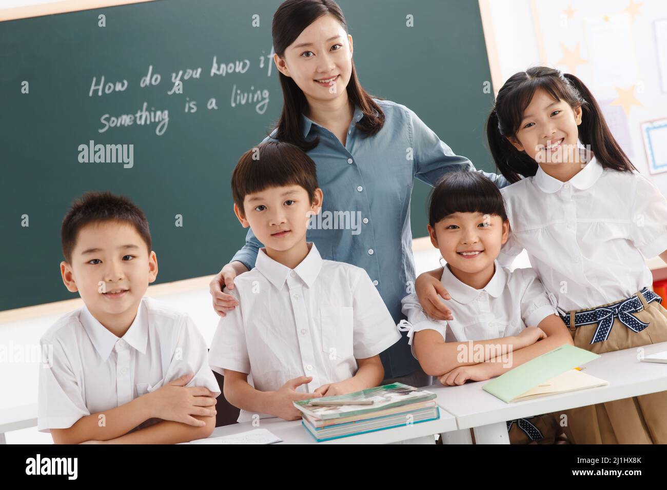 The teachers and pupils are in the classroom Stock Photo - Alamy