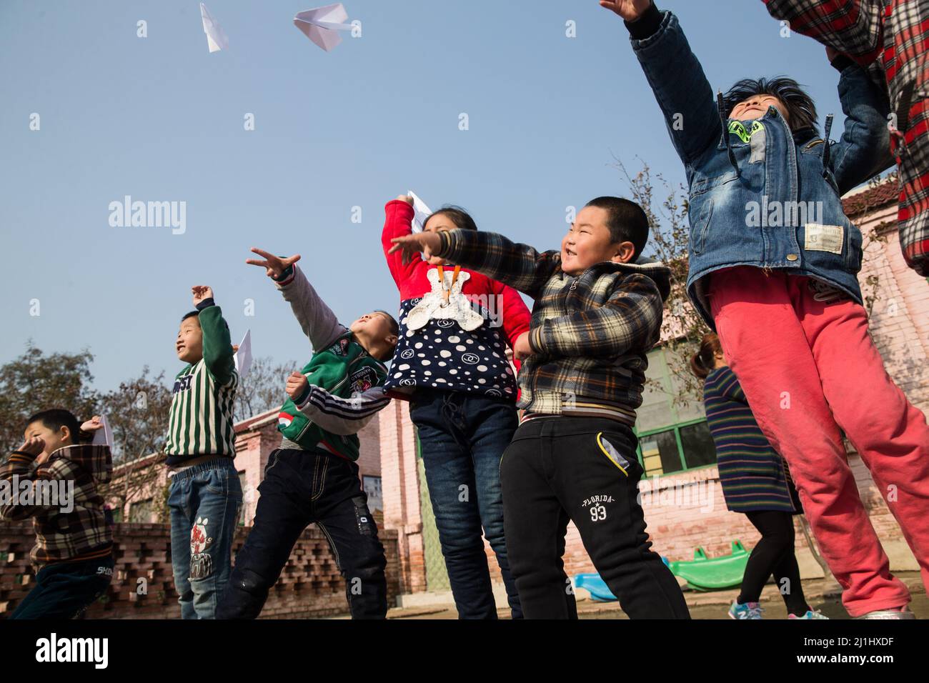 Rural primary school students in the school put a paper airplane Stock ...