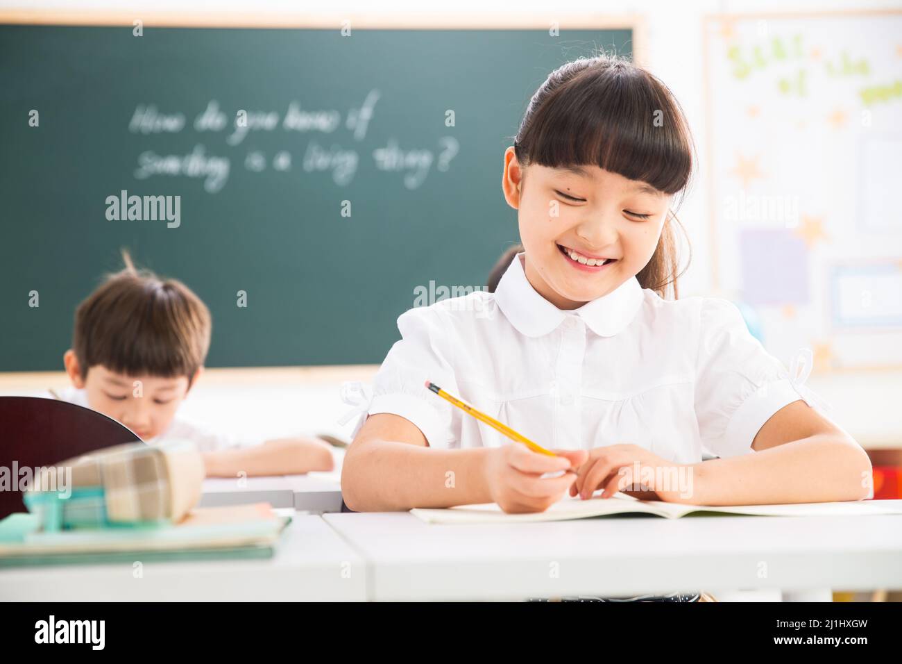 Elementary school students in class Stock Photo - Alamy