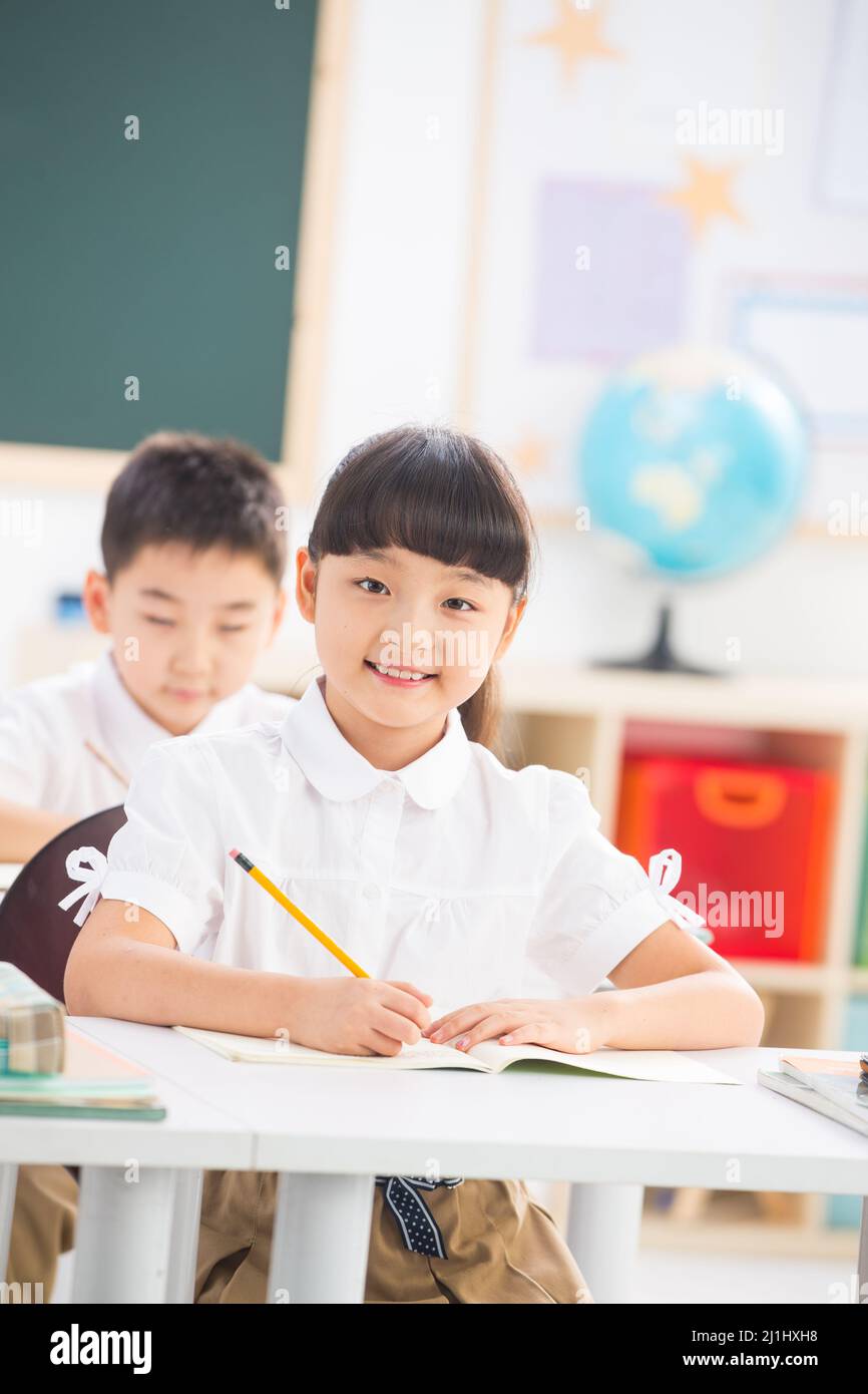 Elementary school students in class Stock Photo - Alamy
