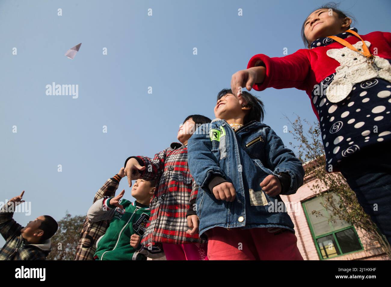 Rural primary school students in the school put a paper airplane Stock ...