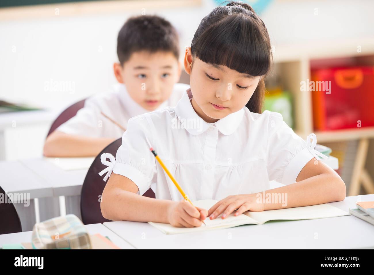 Elementary school students in class Stock Photo - Alamy