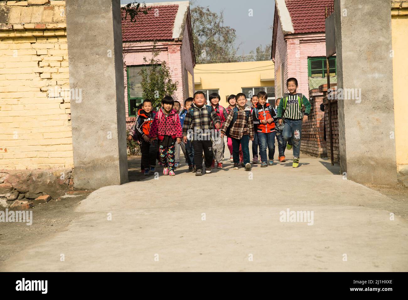 Rural primary school students in the home from school Stock Photo - Alamy