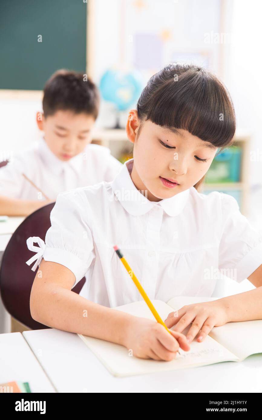Elementary school students in class Stock Photo - Alamy