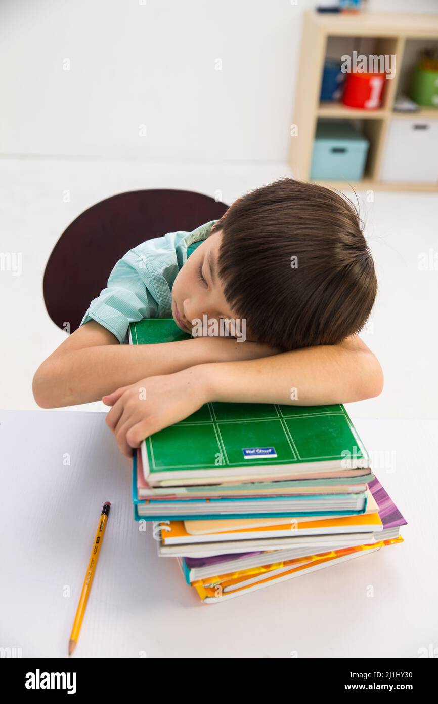 Elementary school students sleep in the classroom Stock Photo - Alamy