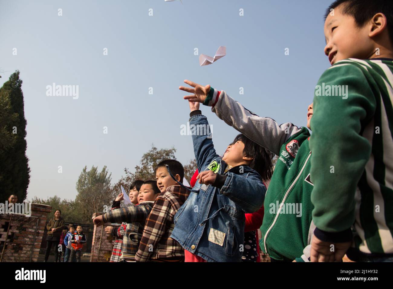 Rural primary school students in the school put a paper airplane Stock ...