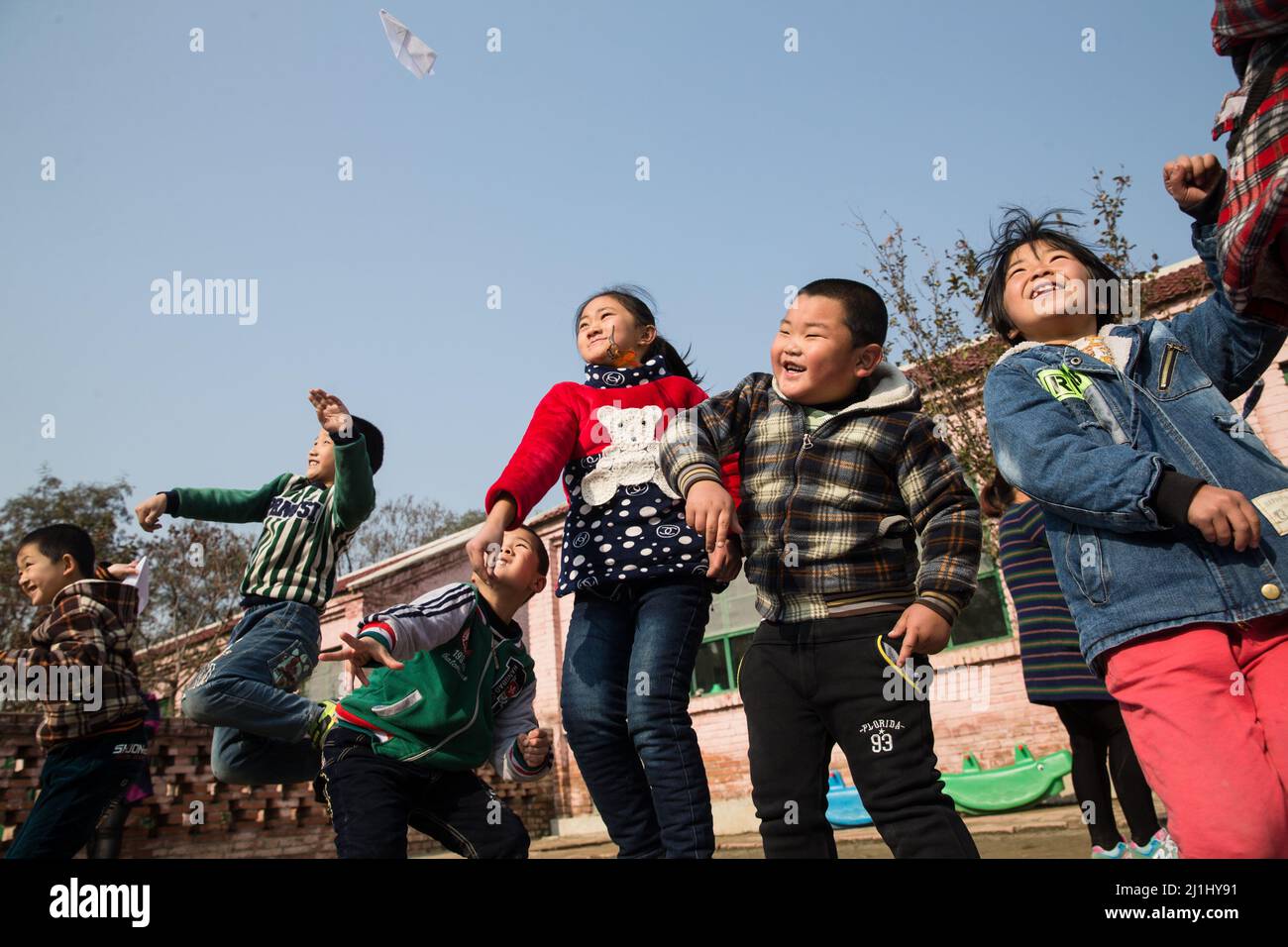 Rural primary school students in the school put a paper airplane Stock ...