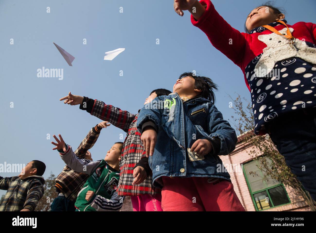 Rural primary school students in the school put a paper airplane Stock ...
