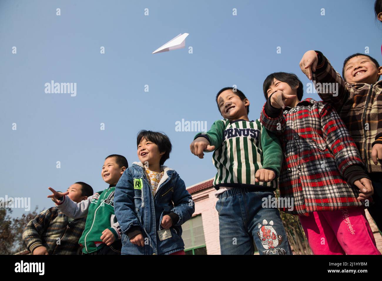 Rural primary school students in the school put a paper airplane Stock ...