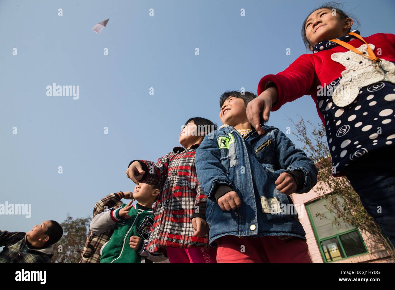 Rural primary school students in the school put a paper airplane Stock ...