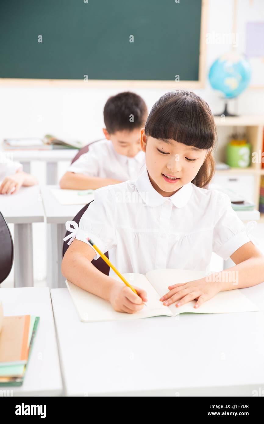 Elementary school students in class Stock Photo - Alamy