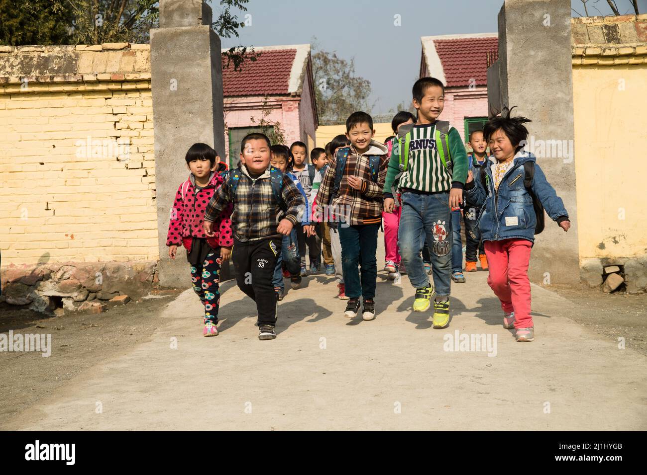 Rural primary school students in the home from school Stock Photo - Alamy