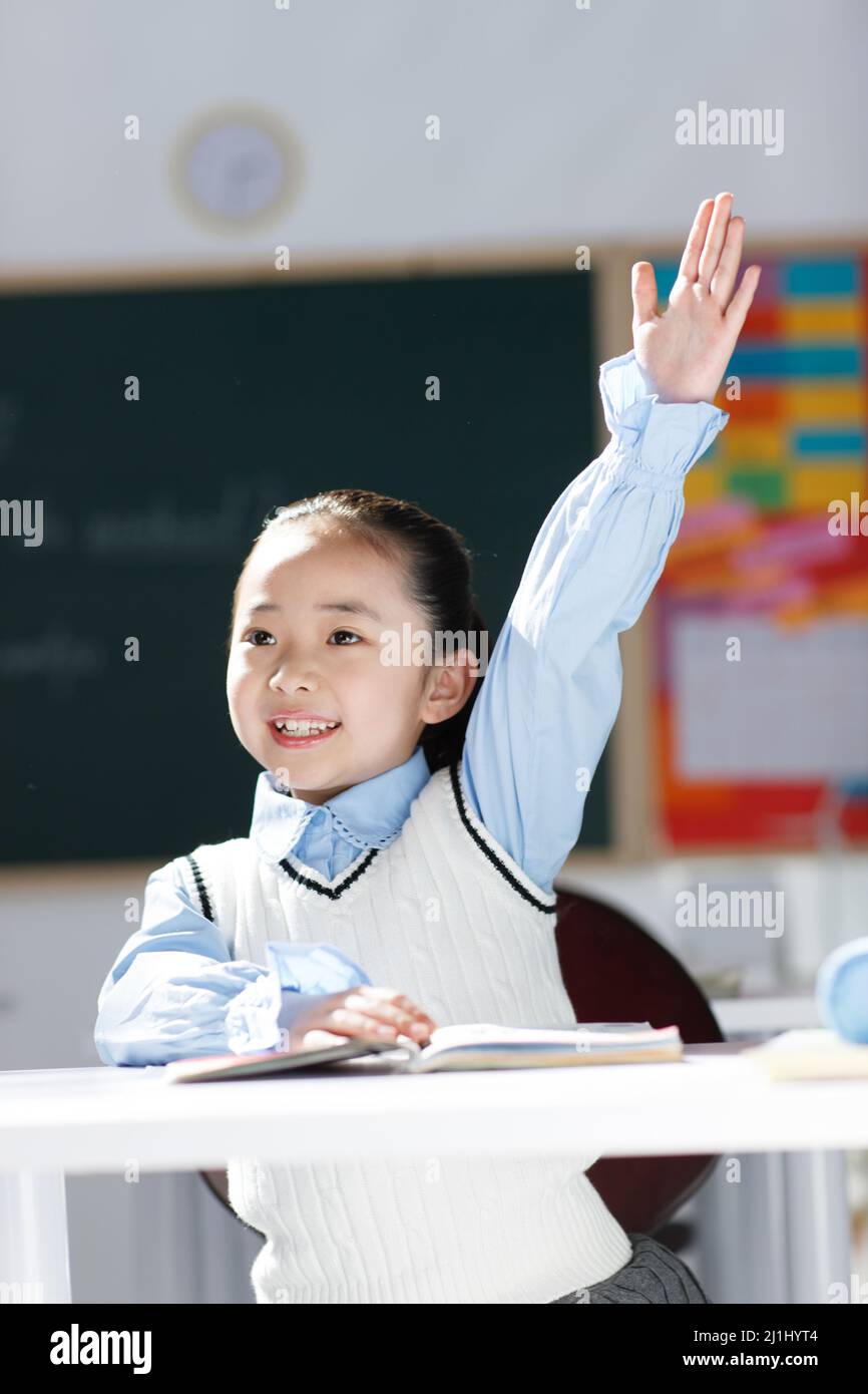 Elementary school students in class Stock Photo - Alamy