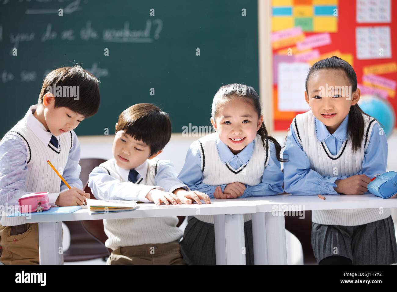 Elementary school students in class Stock Photo - Alamy