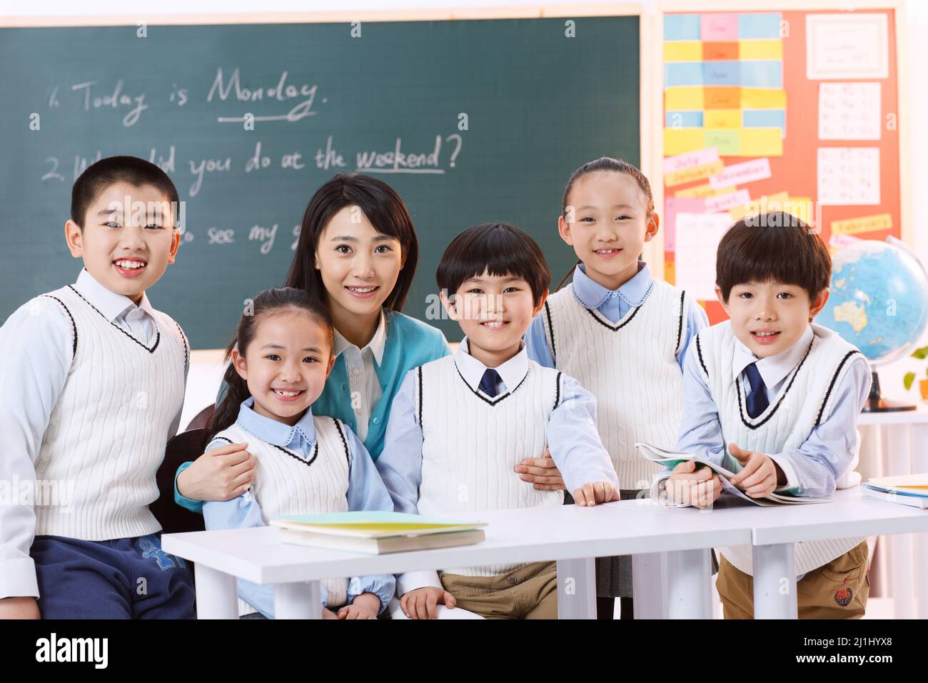 Elementary school students in class Stock Photo - Alamy