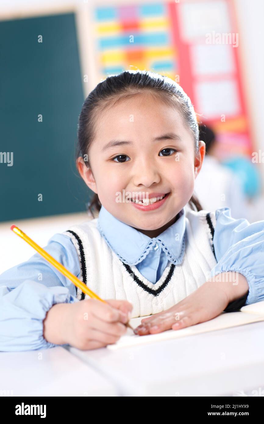 Elementary school students in class Stock Photo - Alamy