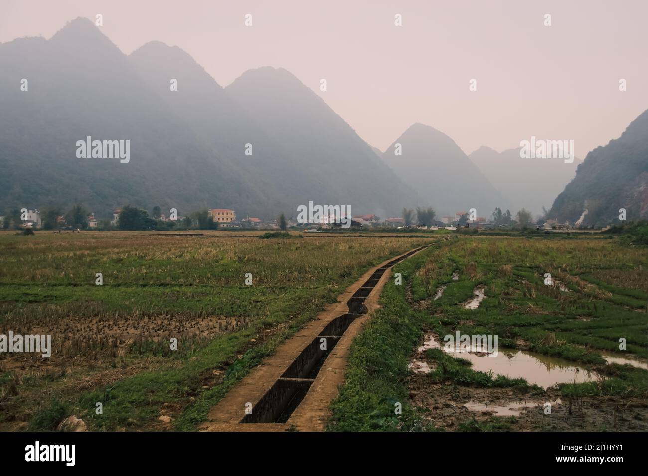 Cinematic scenery of fogs covering the karst mountains in rural Bac Son ...