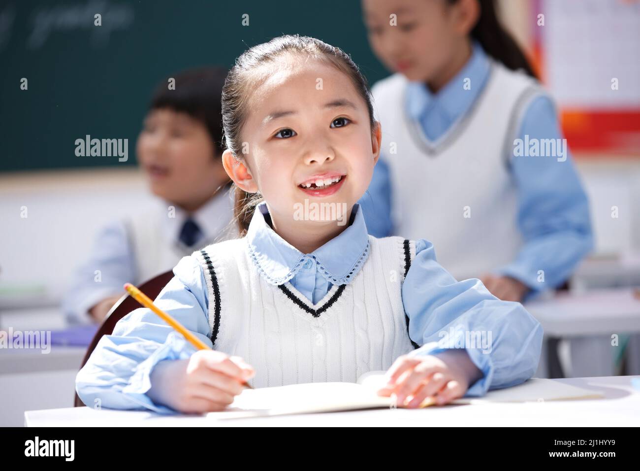 Elementary school students in class Stock Photo - Alamy