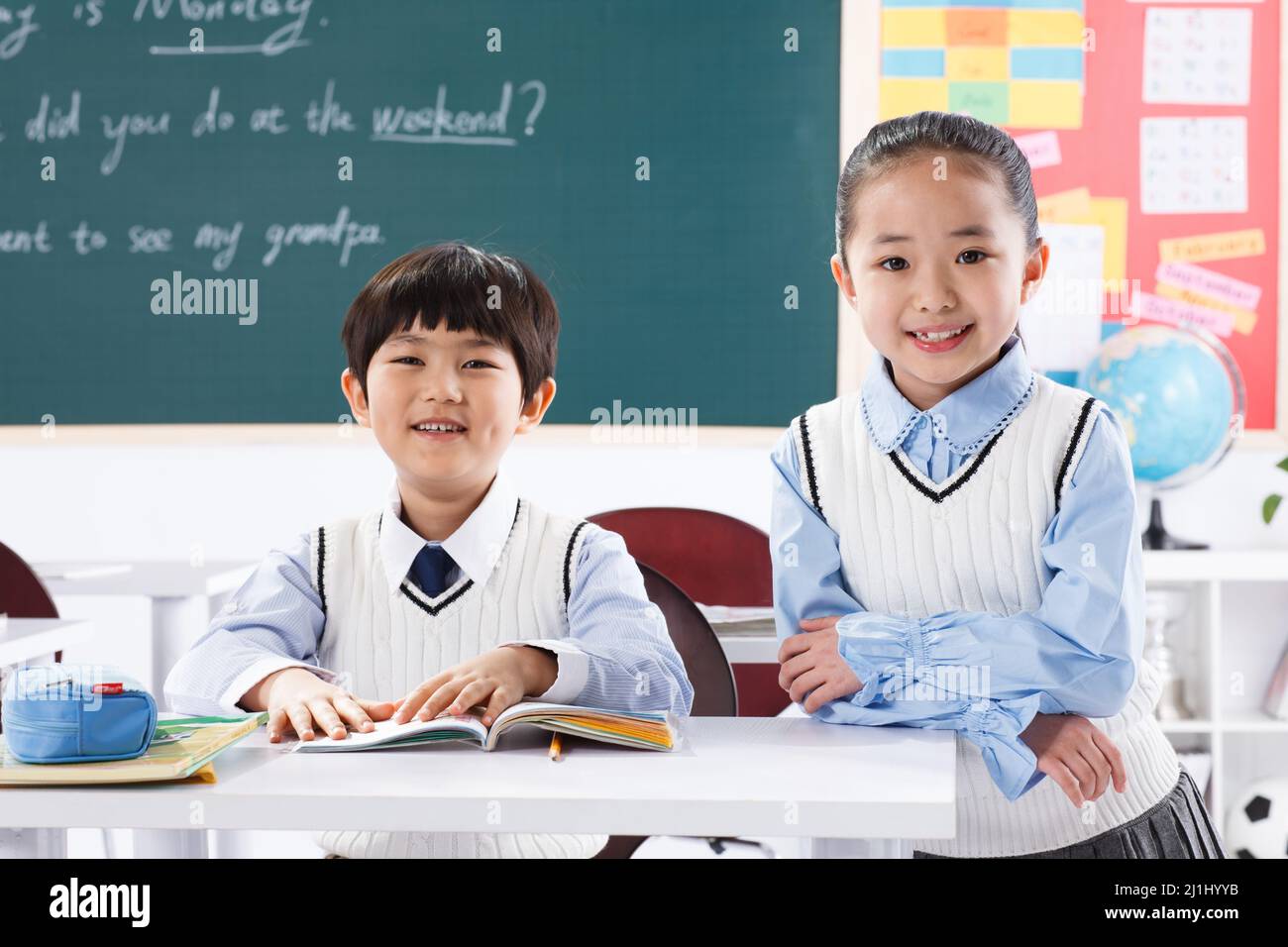 Elementary school students in class Stock Photo - Alamy