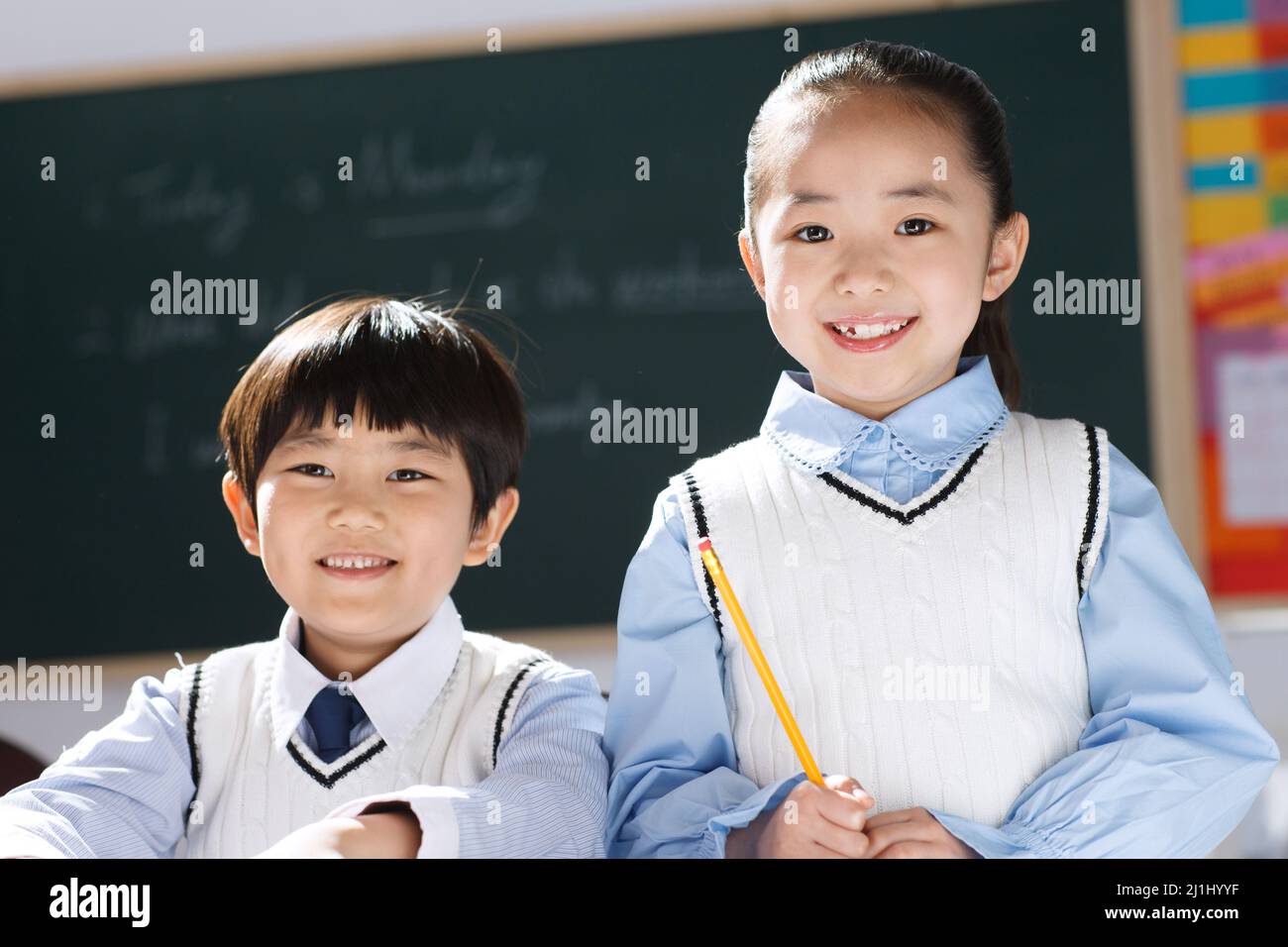 Elementary school students in class Stock Photo - Alamy
