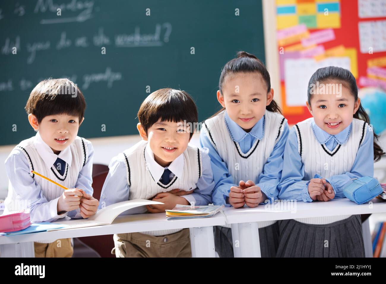 Elementary school students in class Stock Photo - Alamy