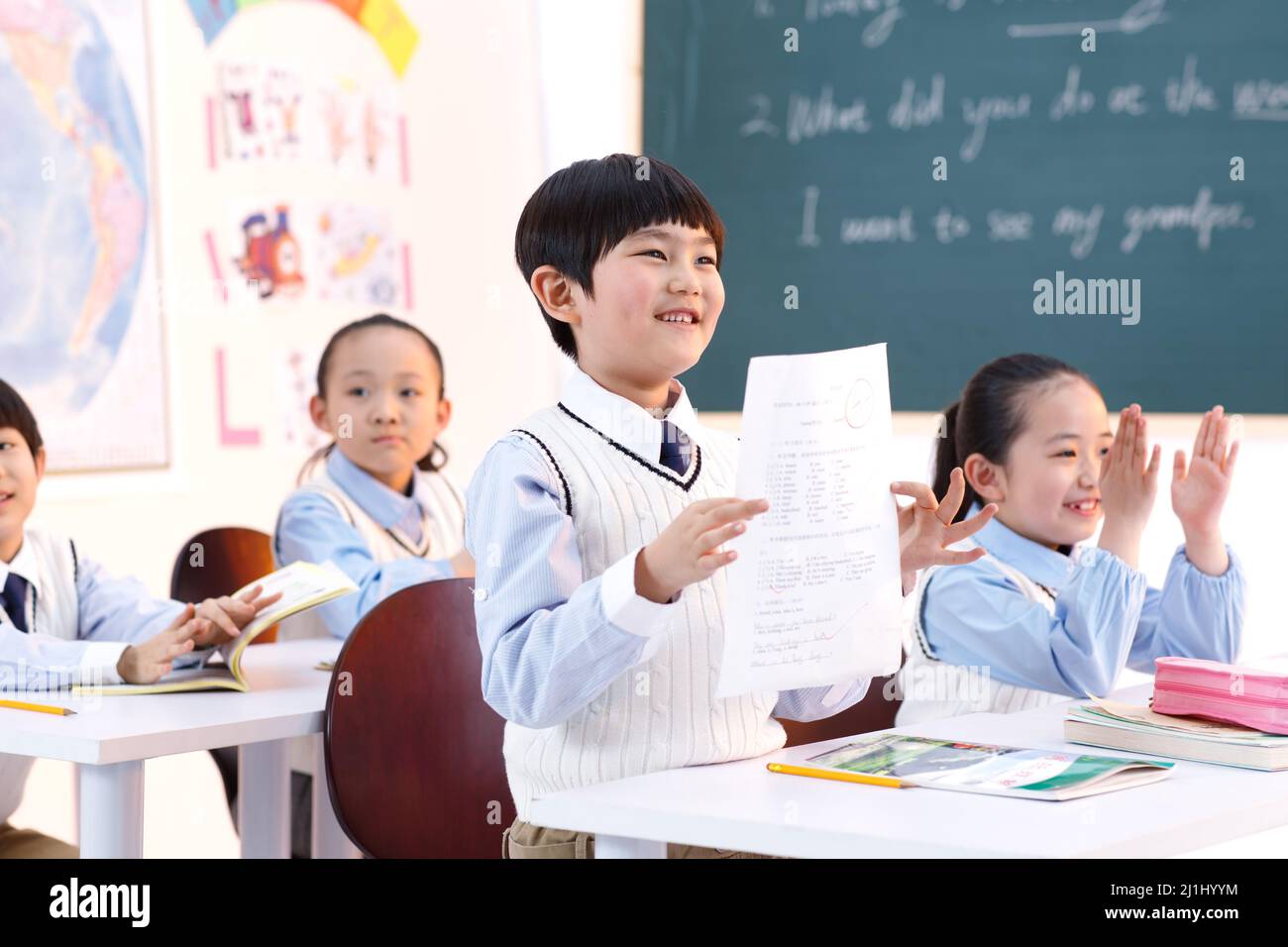 Elementary school students in class Stock Photo - Alamy