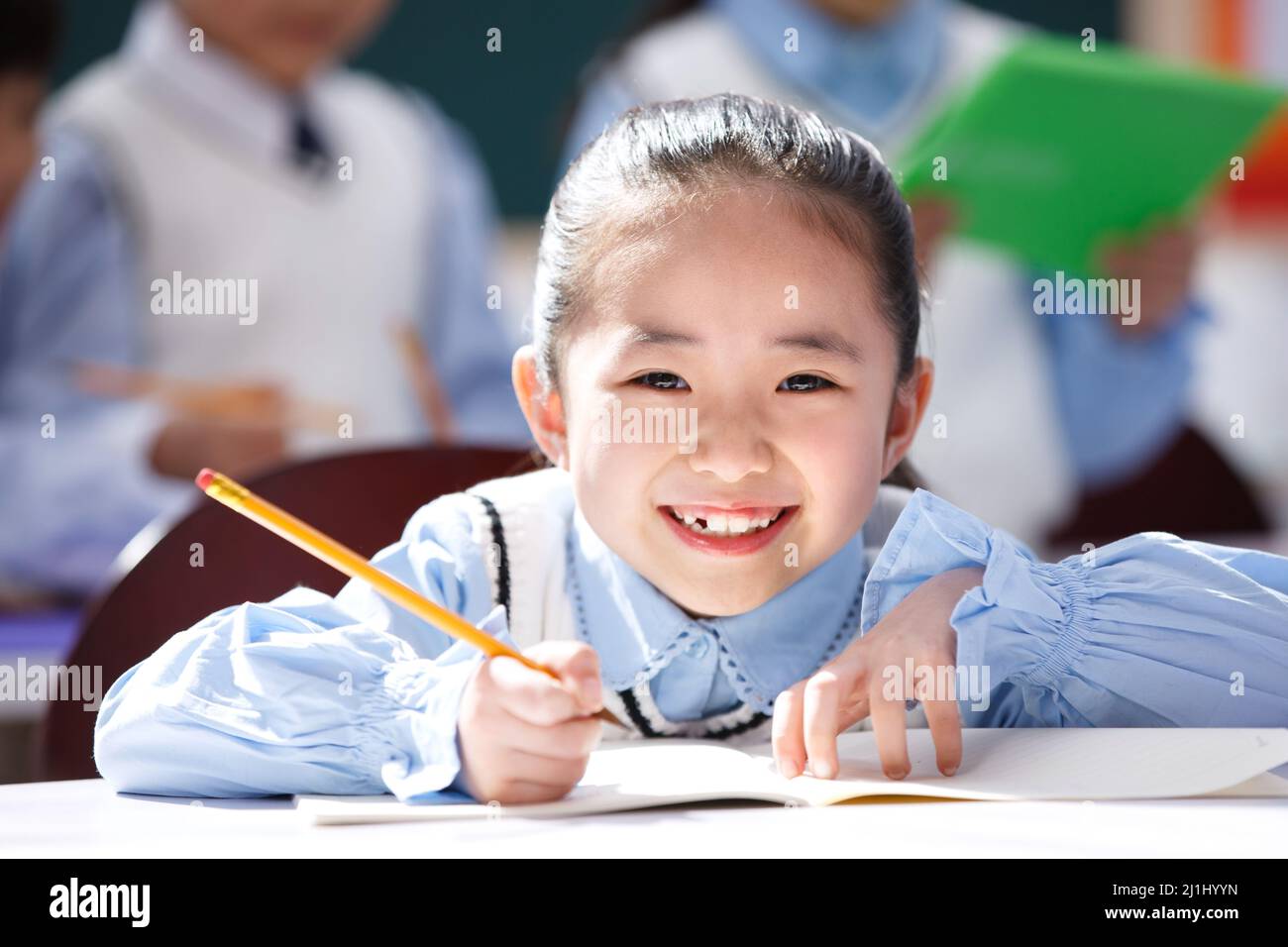 Elementary school students in class Stock Photo - Alamy
