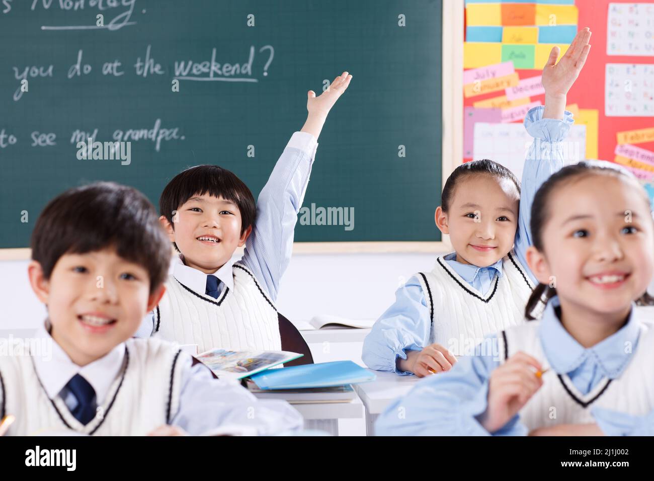 Elementary school students in class Stock Photo - Alamy