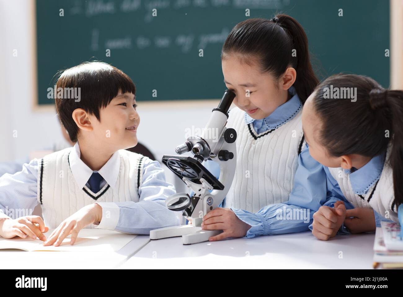 Elementary school students in class Stock Photo - Alamy