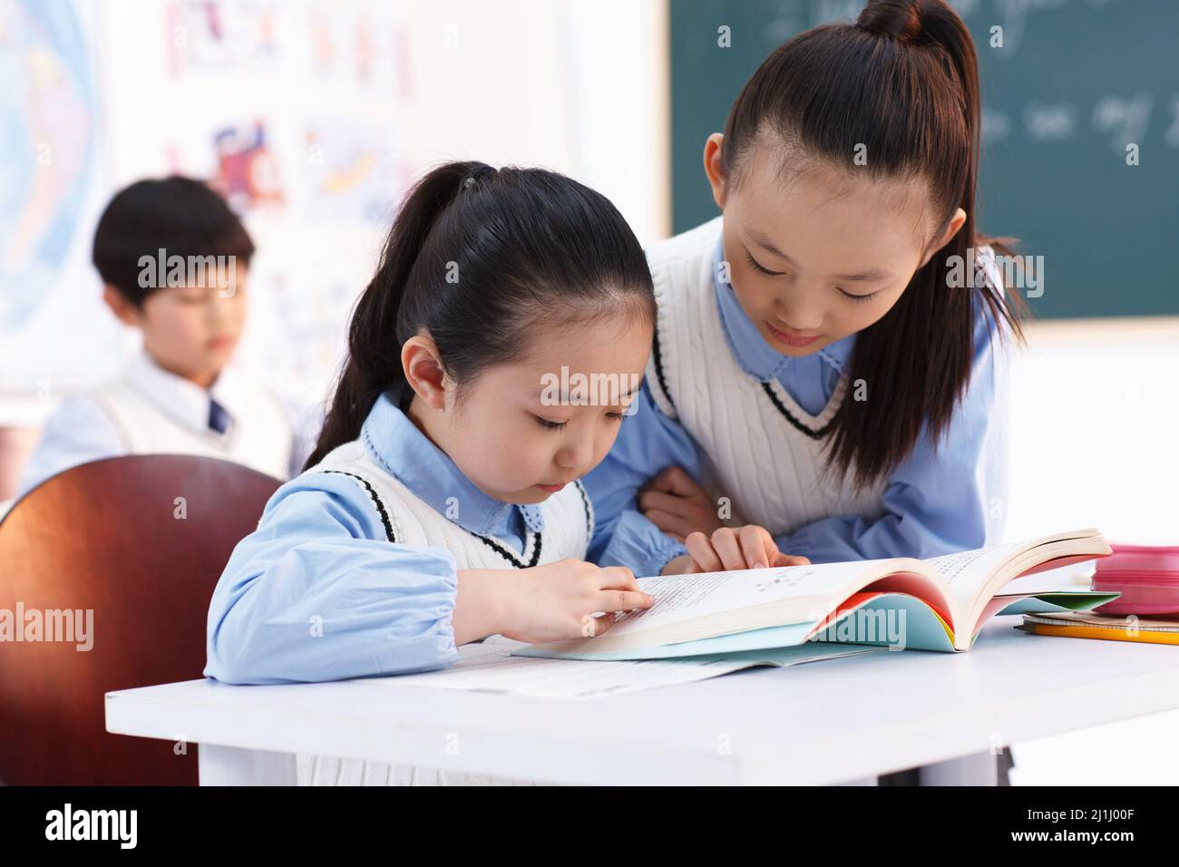 Elementary school students in class Stock Photo - Alamy