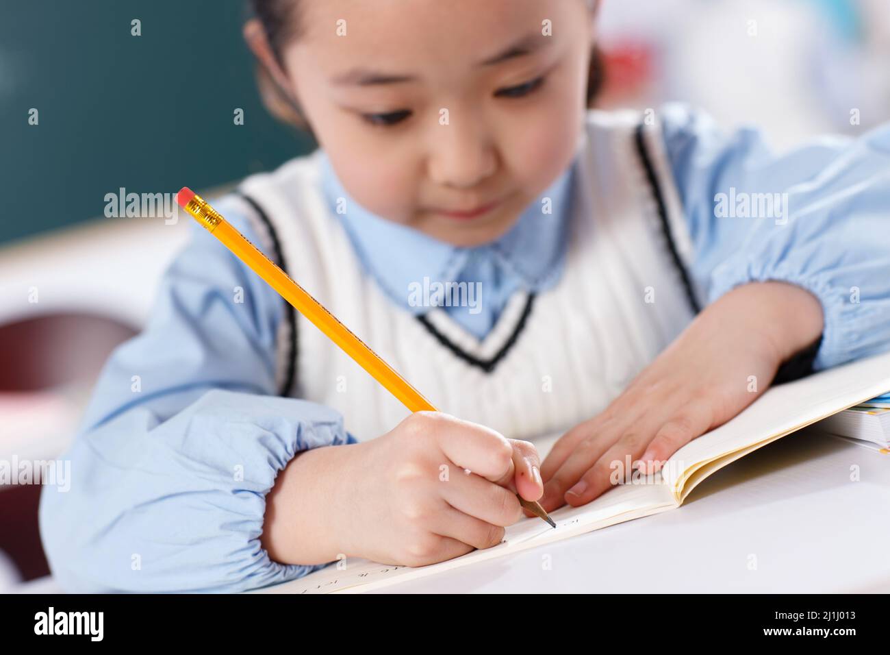 Elementary school students in class Stock Photo - Alamy
