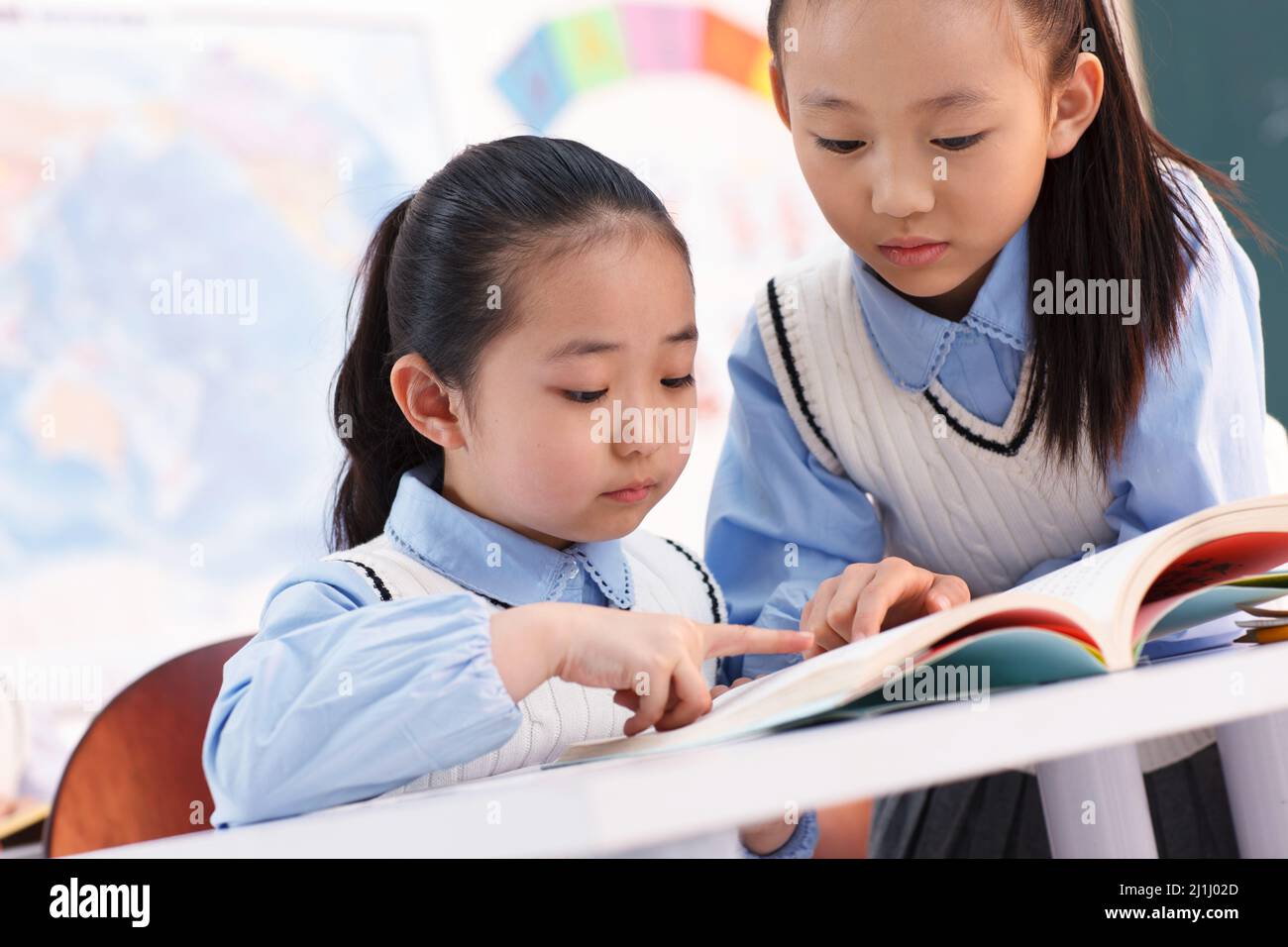 Elementary school students in class Stock Photo - Alamy