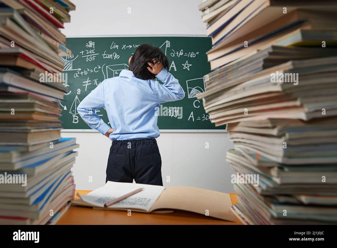 The back of elementary school boys were math problem difficult Stock ...