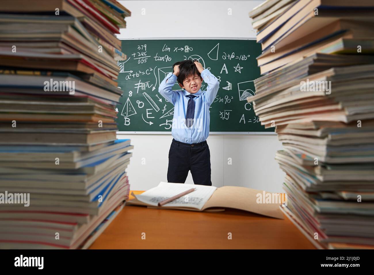 Primary school boys were operation difficult Stock Photo - Alamy