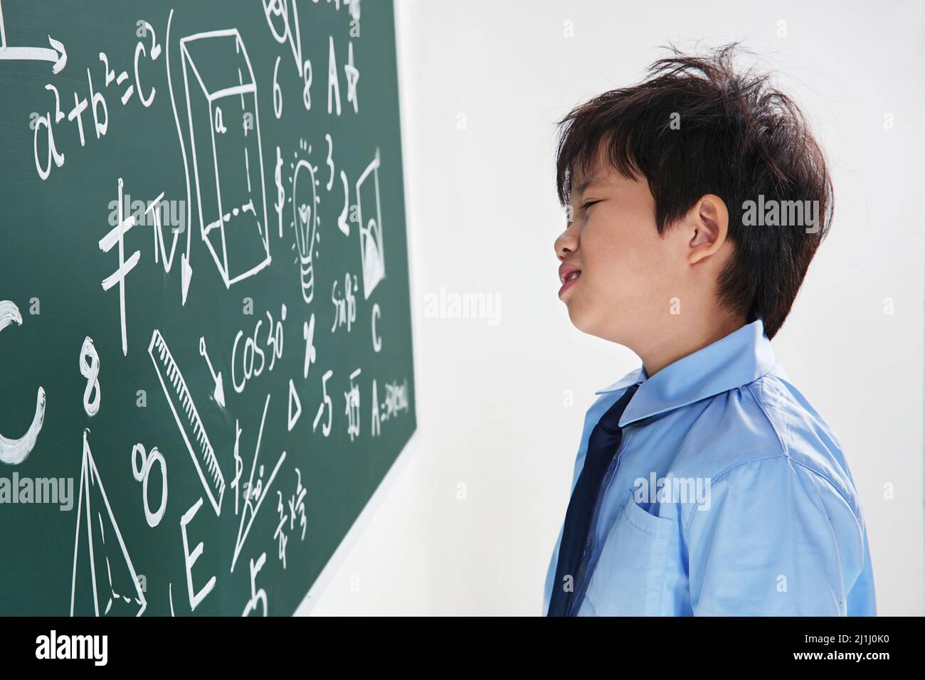Math problem boy hi-res stock photography and images - Alamy