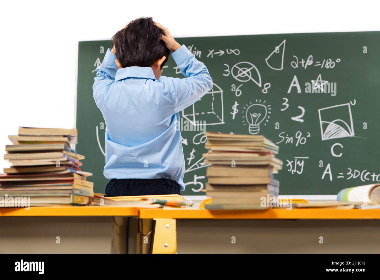 The back of elementary school boys were math problem difficult Stock ...