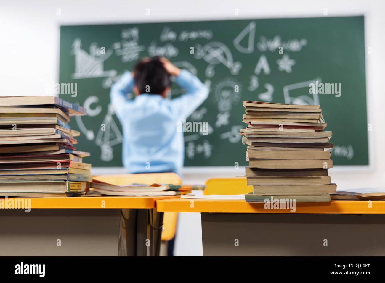 The back of elementary school boys were math problem difficult Stock ...